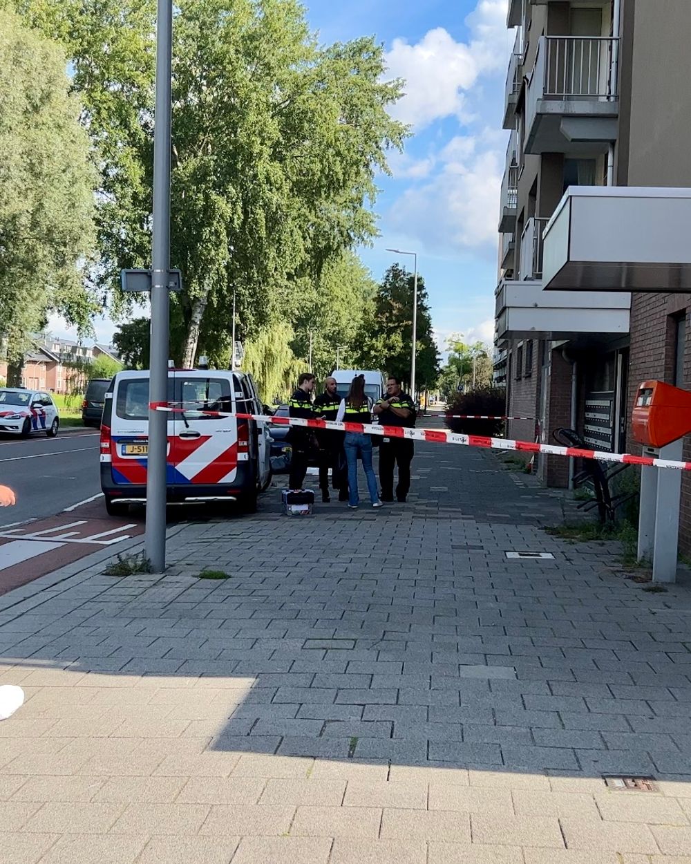 Bewoners flat dodelijke schietpartij: 'Af en toe zien we een emmertje aan een touwtje naar ...